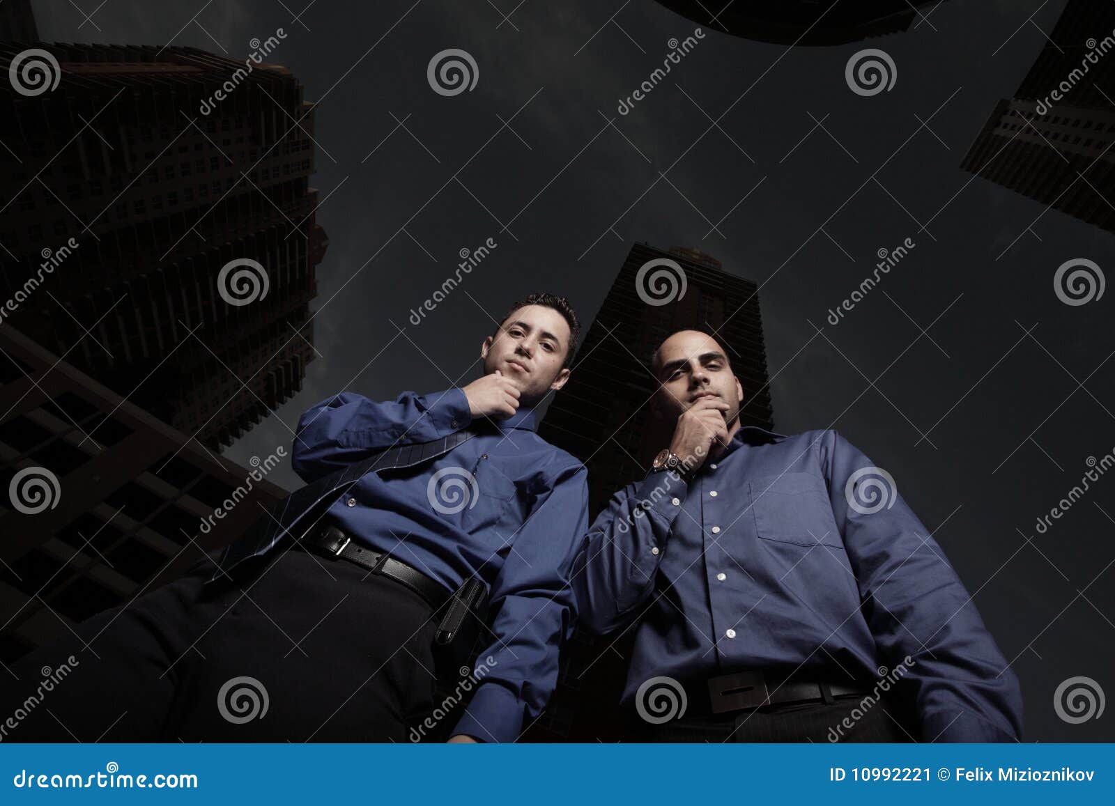 Men looking at the ground stock image. Image of guys - 10992221