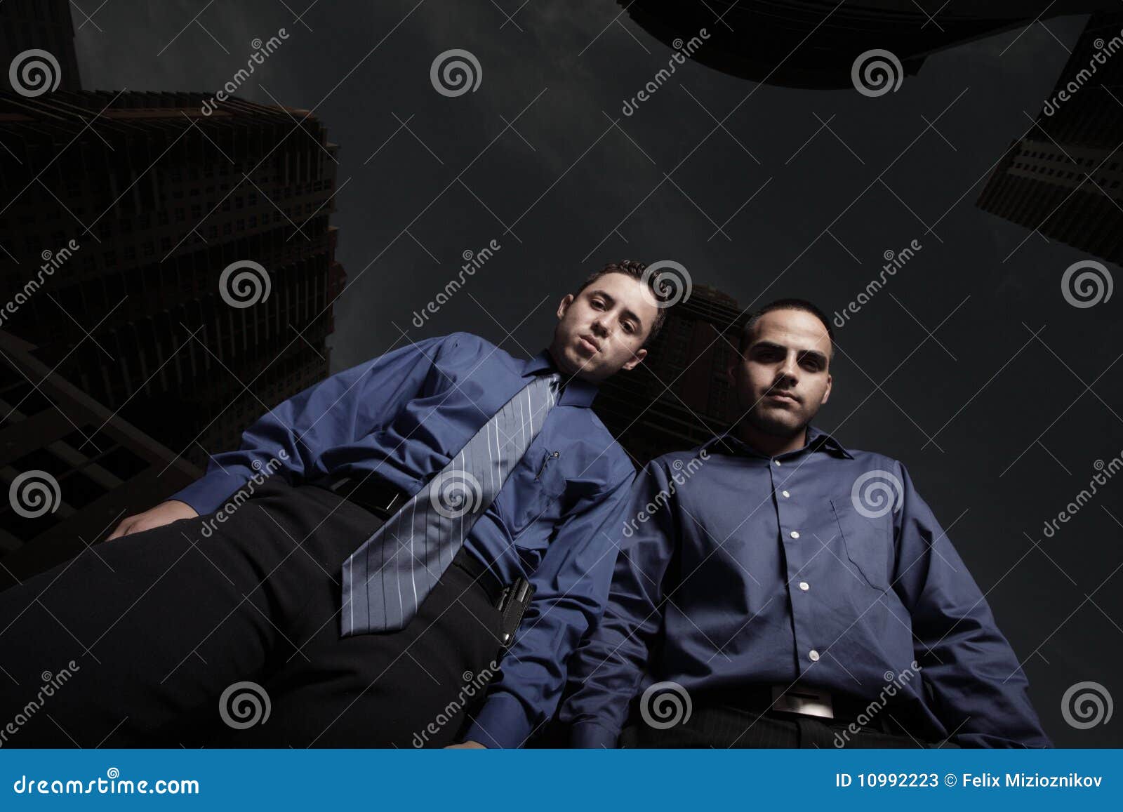 Men looking at the ground stock image. Image of night - 10992223