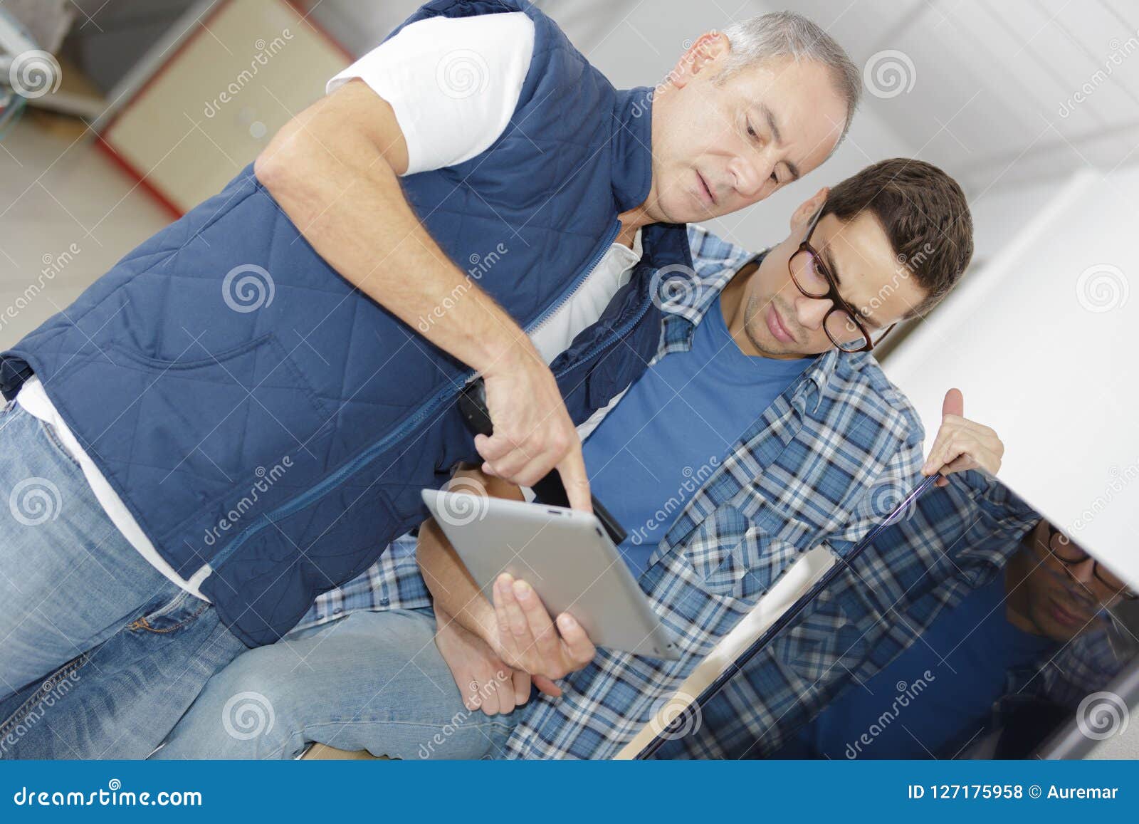 Men Looking at Table Screen Stock Photo - Image of workplace ...