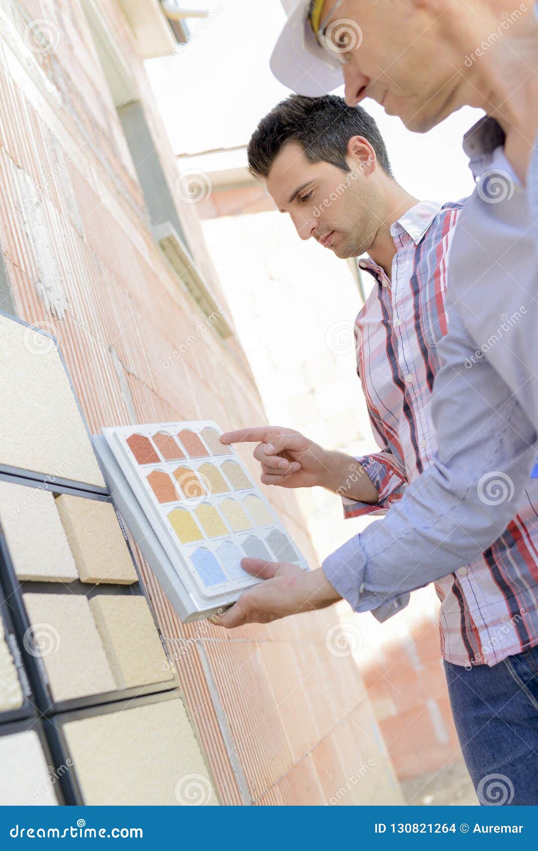 Men looking at tiles stock photo. Image of advise, color - 130821264