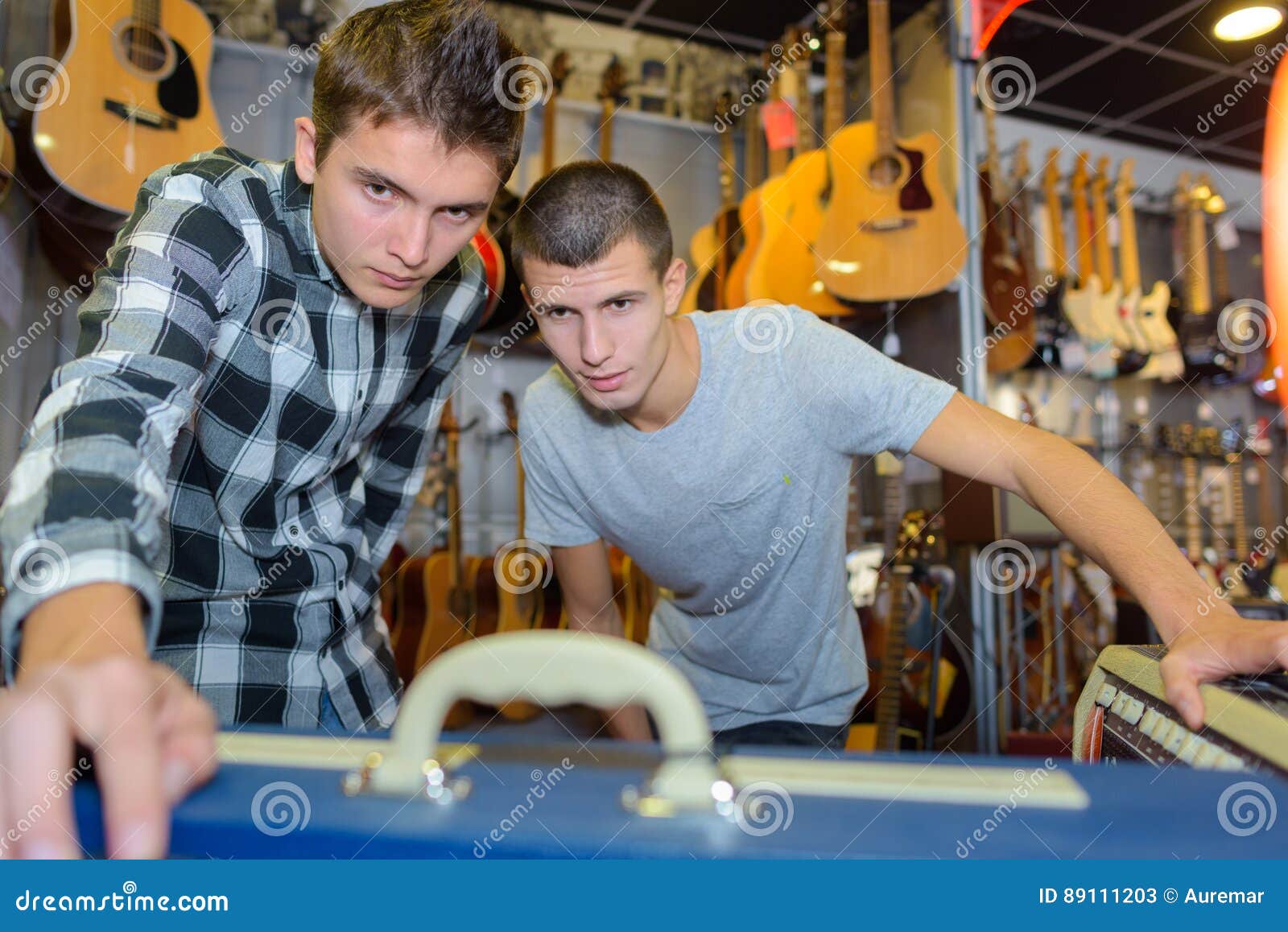 Men in Musical Instrument Shop Stock Image - Image of handsome ...