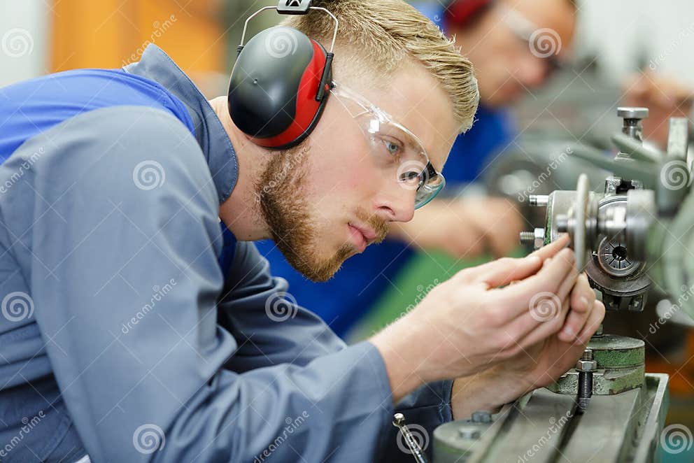 Man operating machine stock image. Image of technician - 160406795