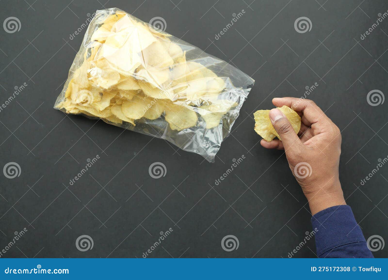 Men Pick Potato Chips from a Plastic Packet Stock Photo - Image of ...