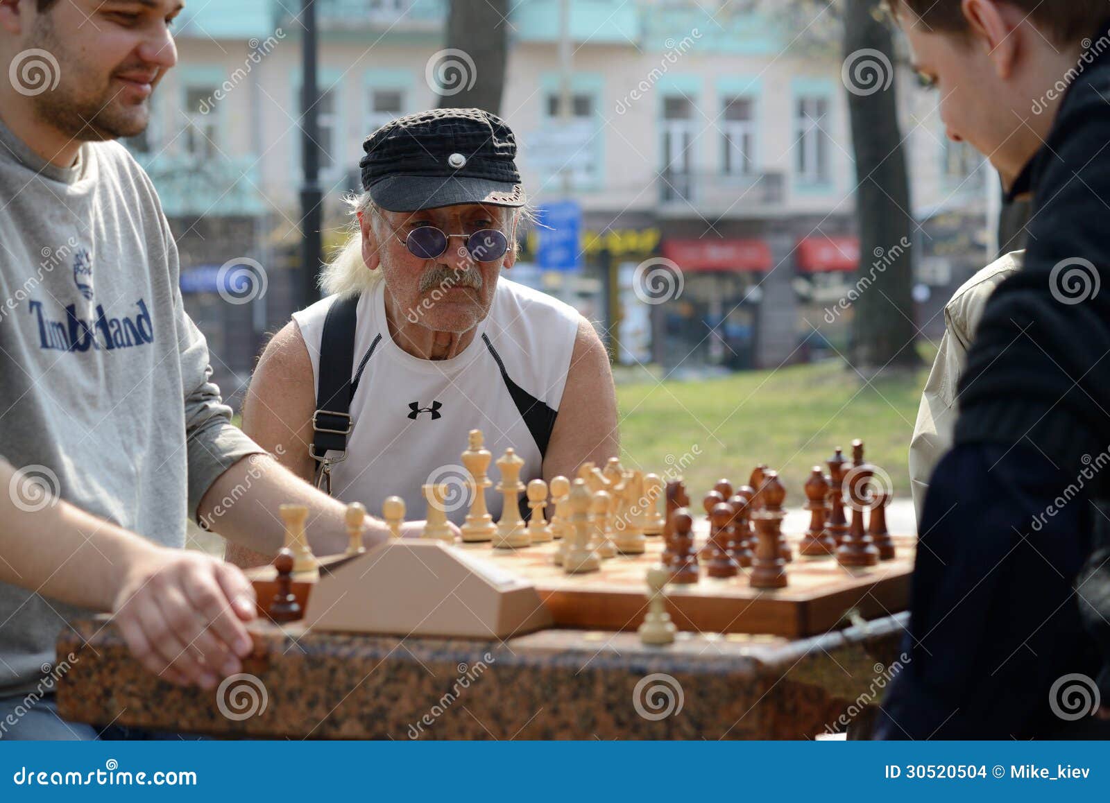 Men playing chess editorial stock image. Image of kiev - 30520504