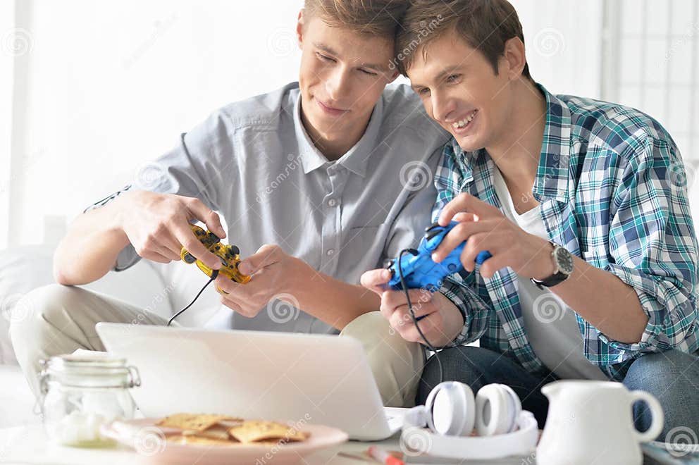 Men playing computer games stock photo. Image of activity - 72542302