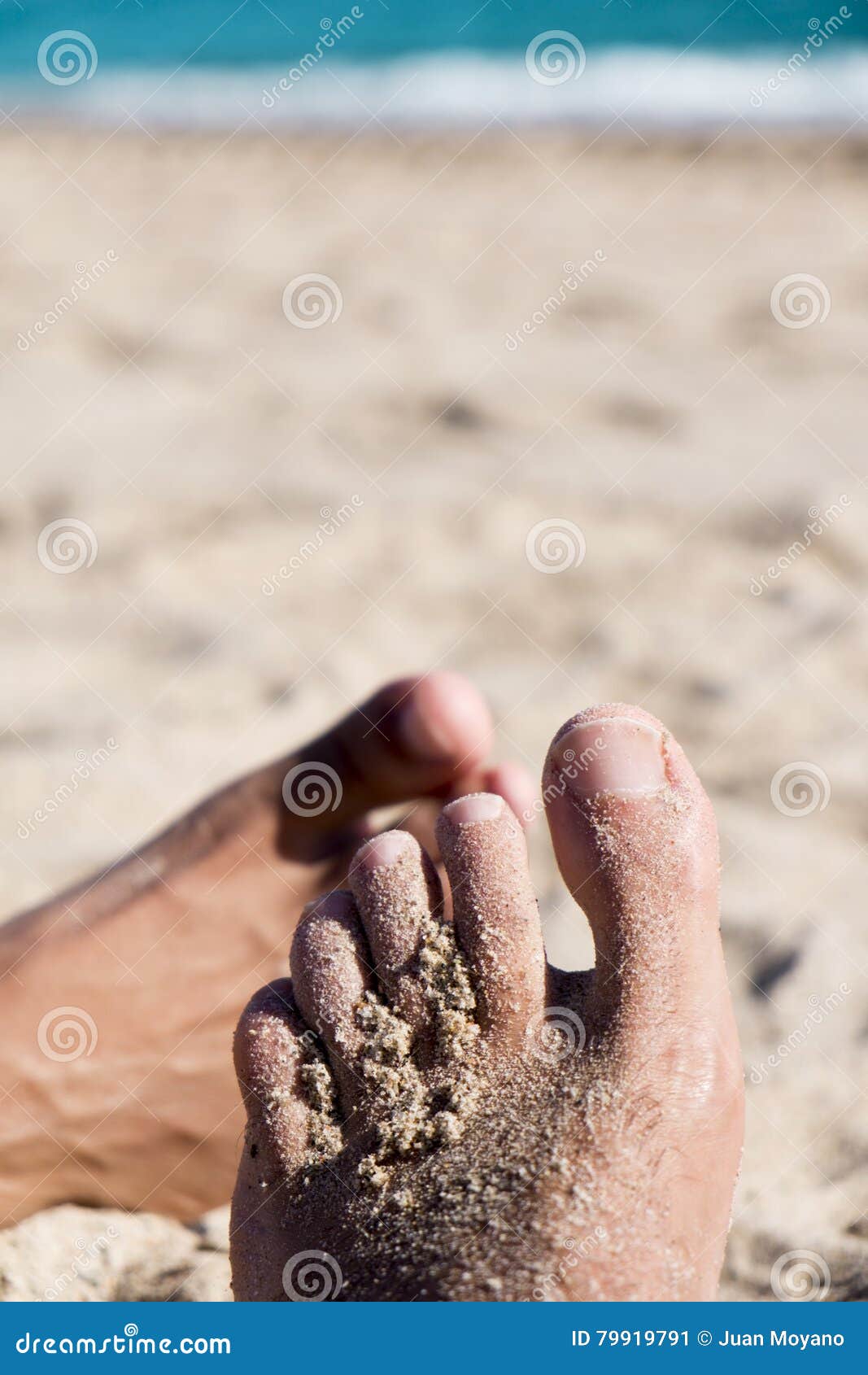 Men Playing Footsie on the Beach Stock Image - Image of love, footsie ...