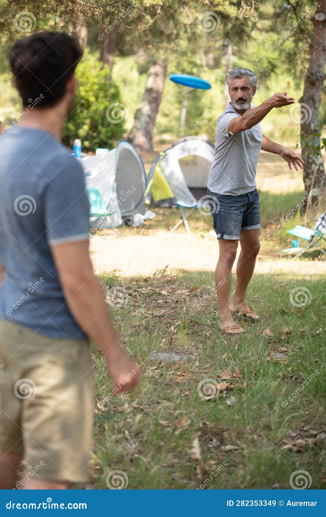 Men Playing Frisbee in Park Stock Image - Image of space, play: 282353349