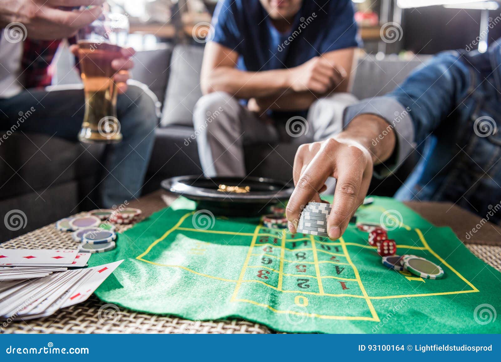 Men playing roulette game stock photo. Image of drinking - 93100164