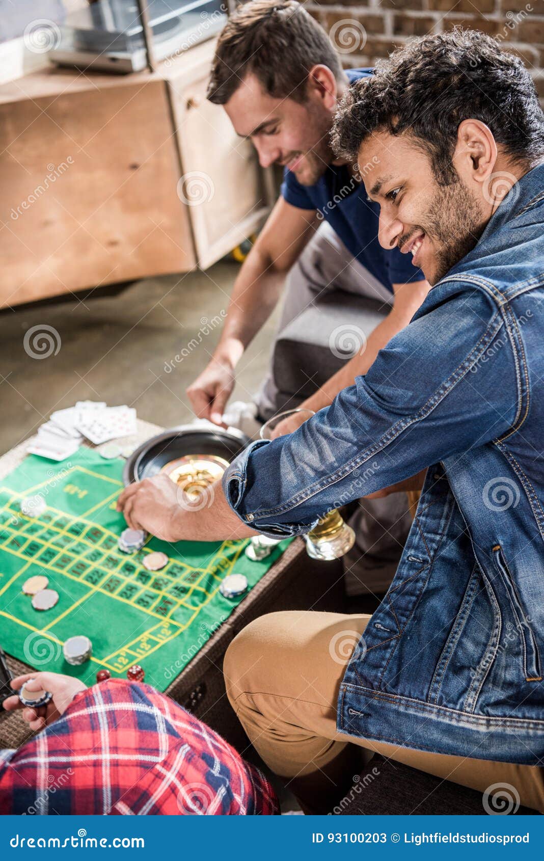 Men playing roulette game stock image. Image of caucasian - 93100203