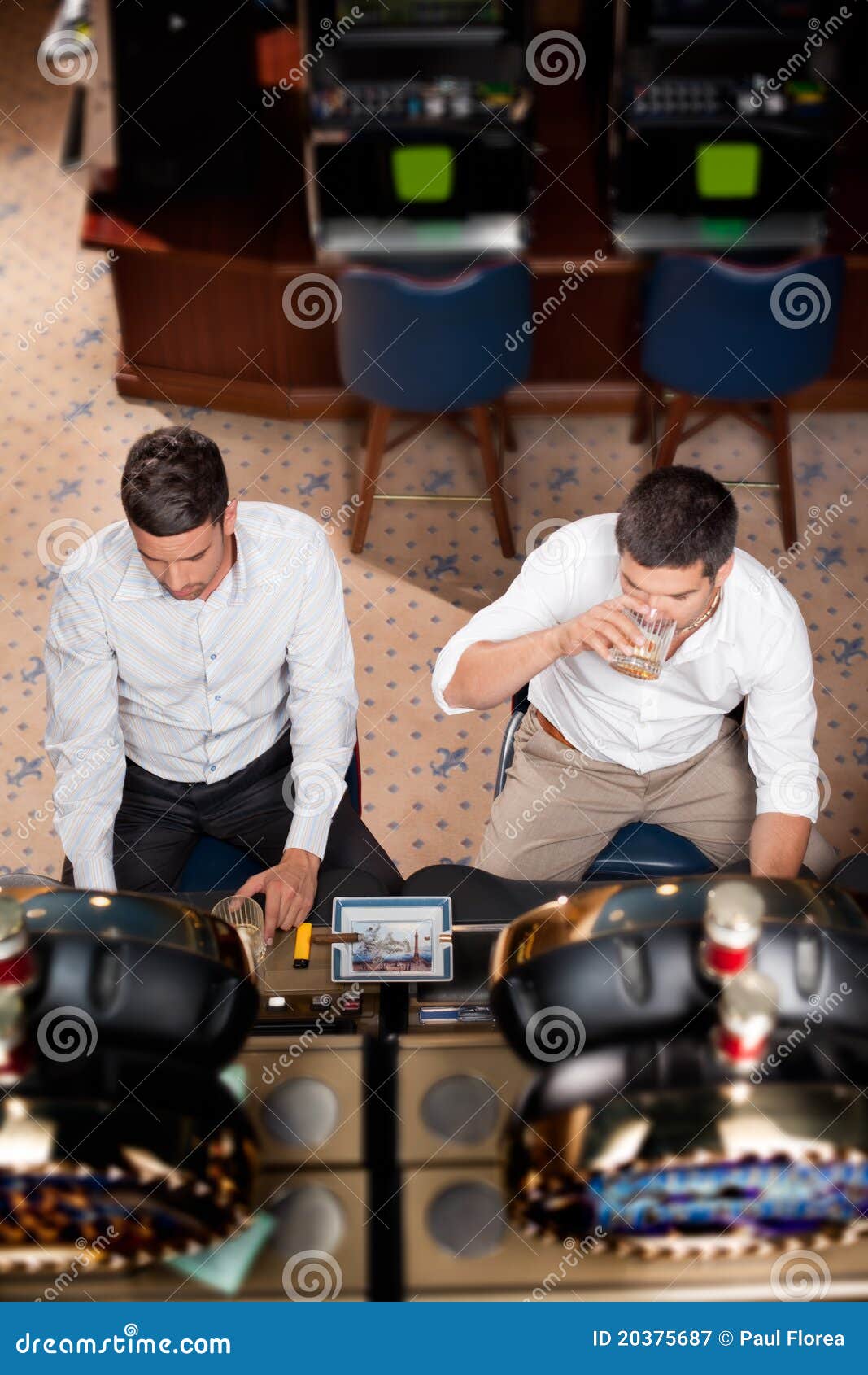 Men Playing the Slot Machine Stock Image - Image of businessman ...