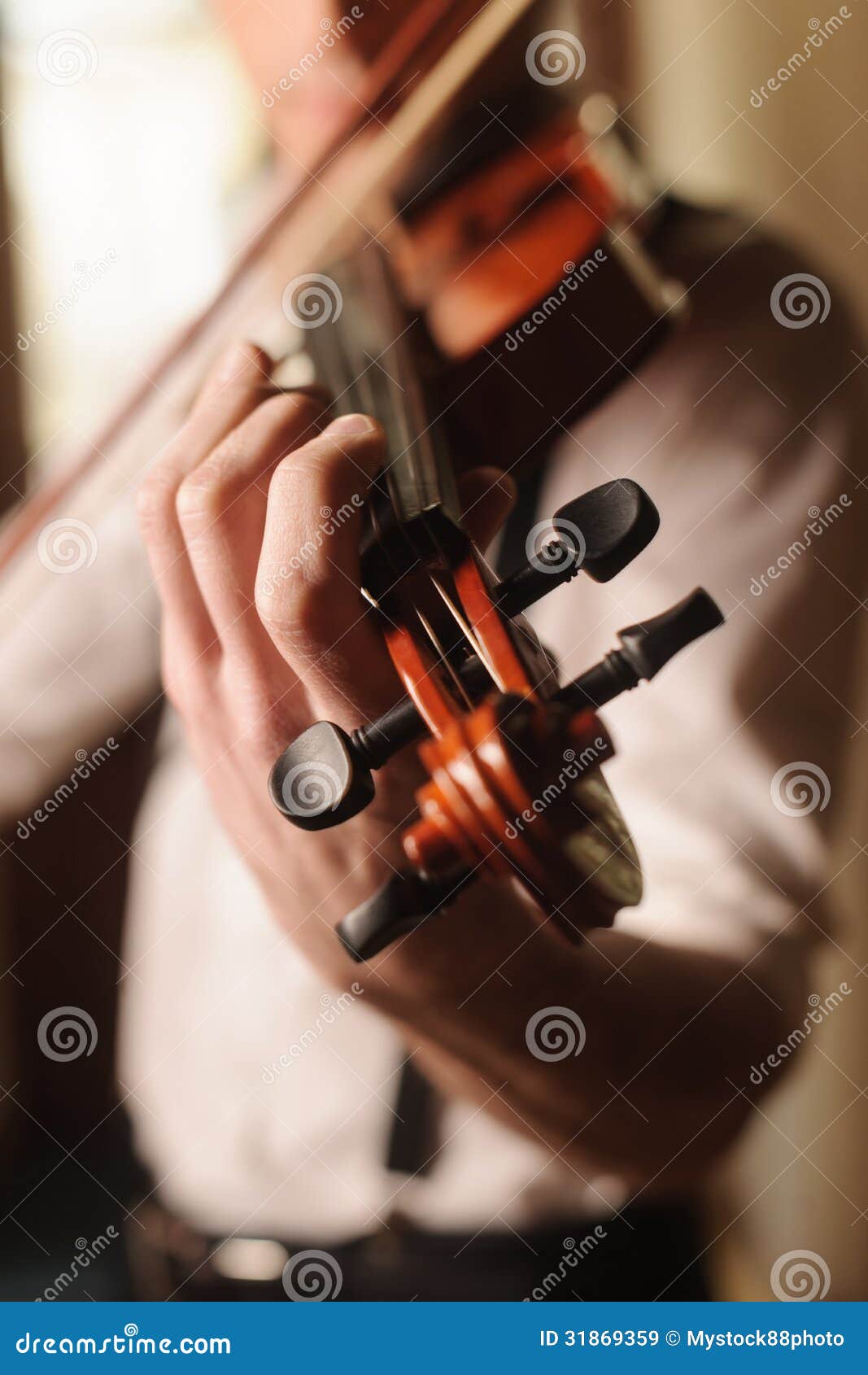 Men playing the violin stock image. Image of performance - 31869359