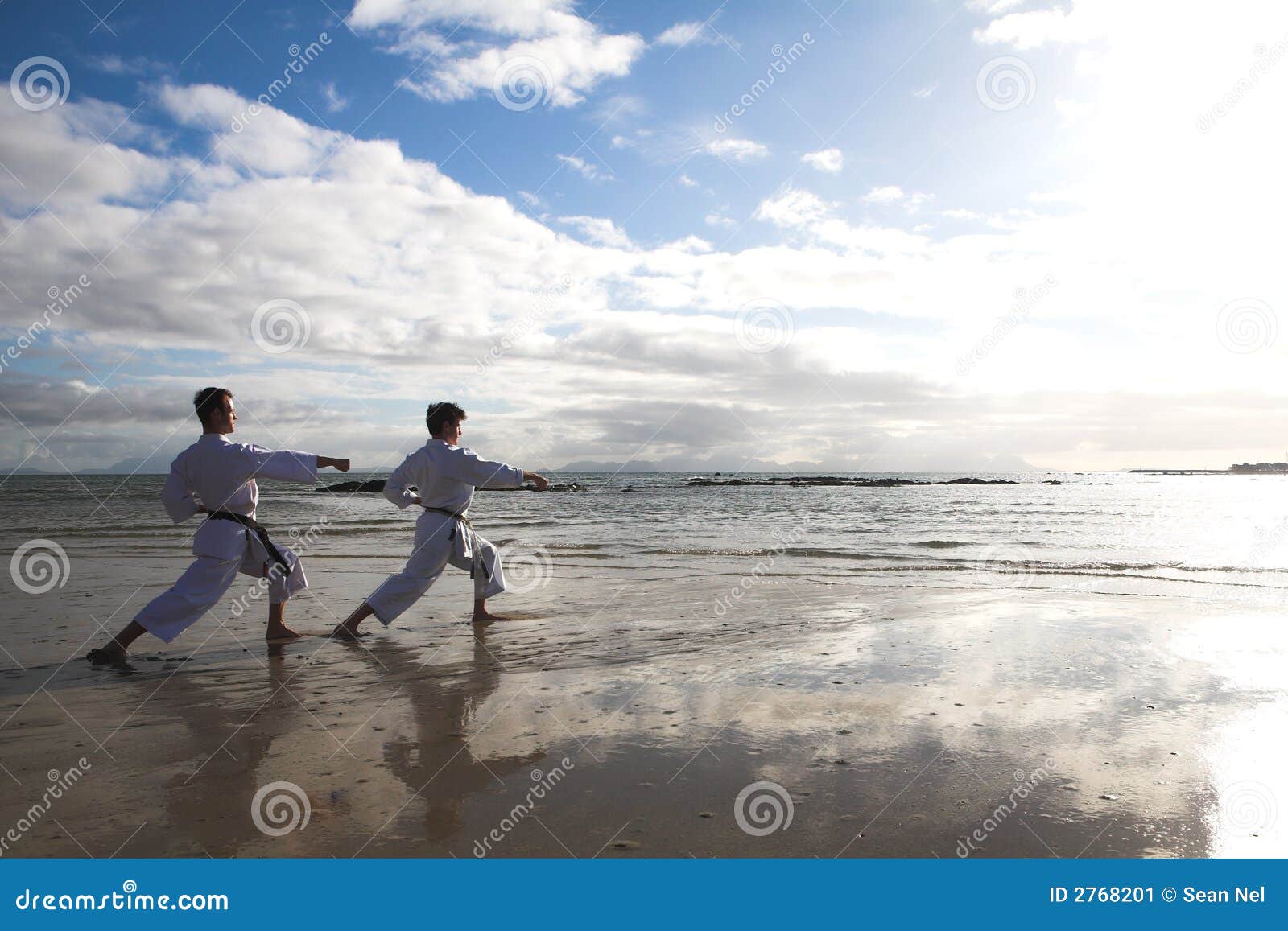 Men Practicing Karate on Beach Stock Image - Image of outdoors, summer ...