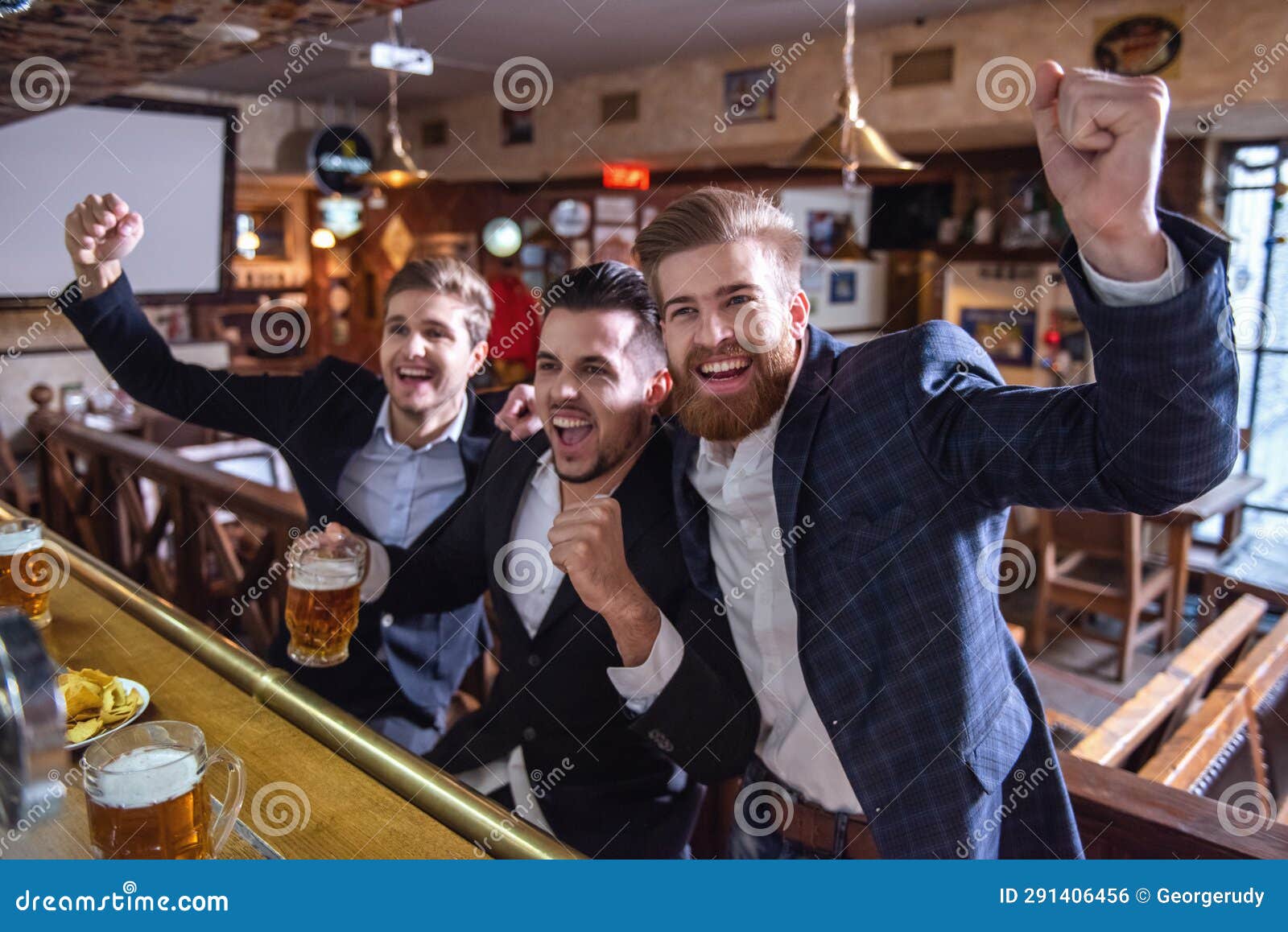 Men at the pub stock photo. Image of group, adult, clinking - 291406456