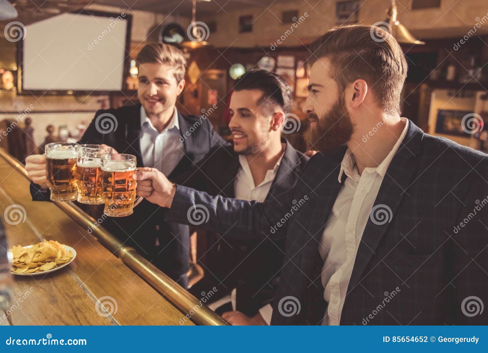 Men at the pub stock photo. Image of businessman, drink - 85654652