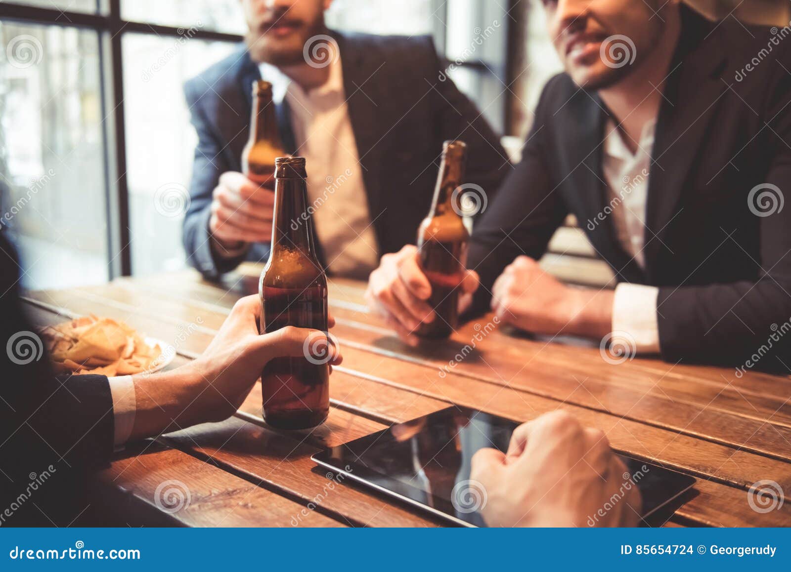 Men at the pub stock photo. Image of colleague, business - 85654724