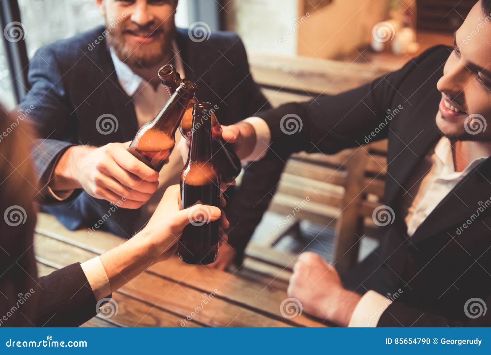 Men at the pub stock photo. Image of corporate, beer - 85654790