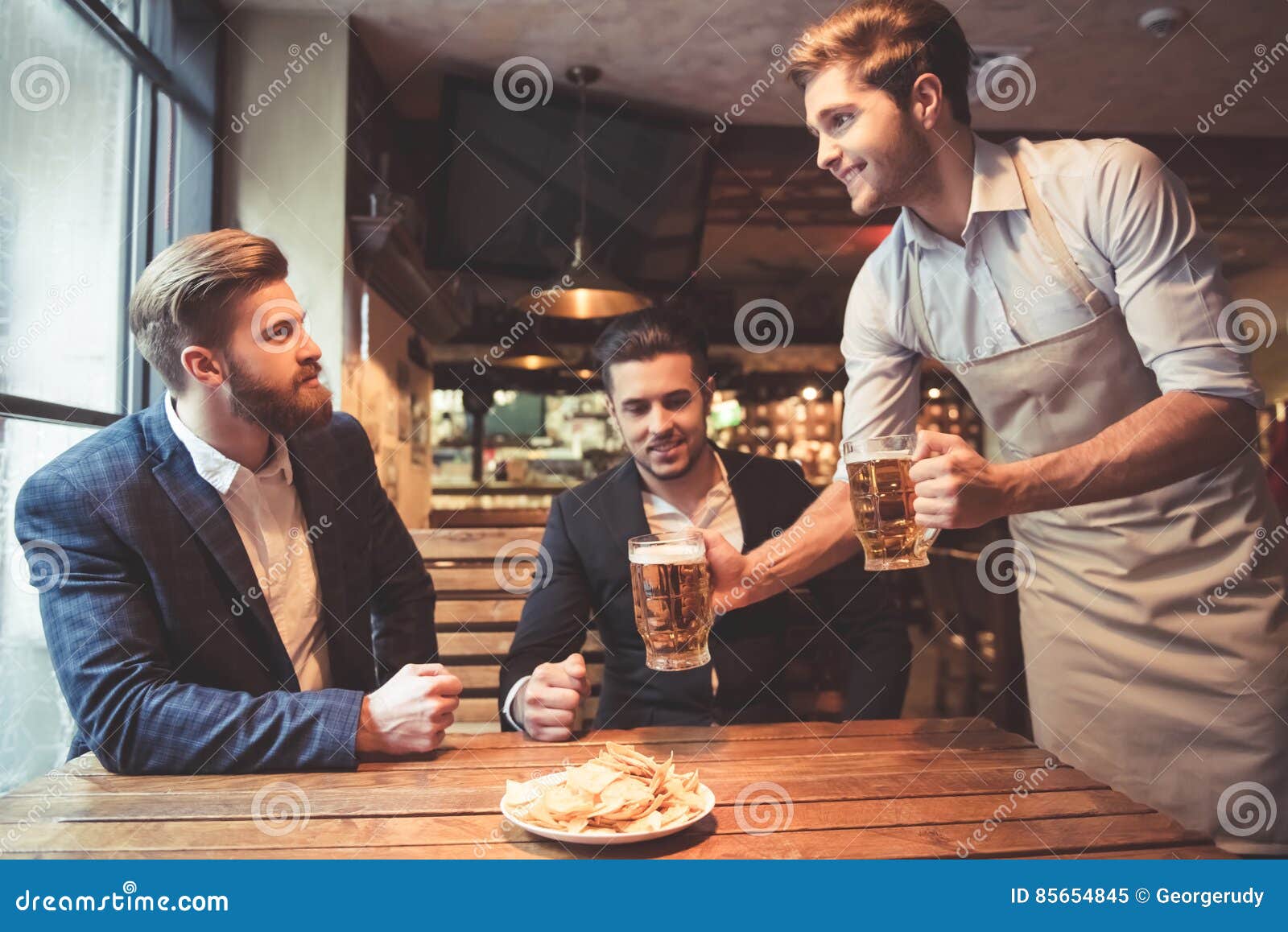 Men at the pub stock image. Image of lifestyle, drink - 85654845