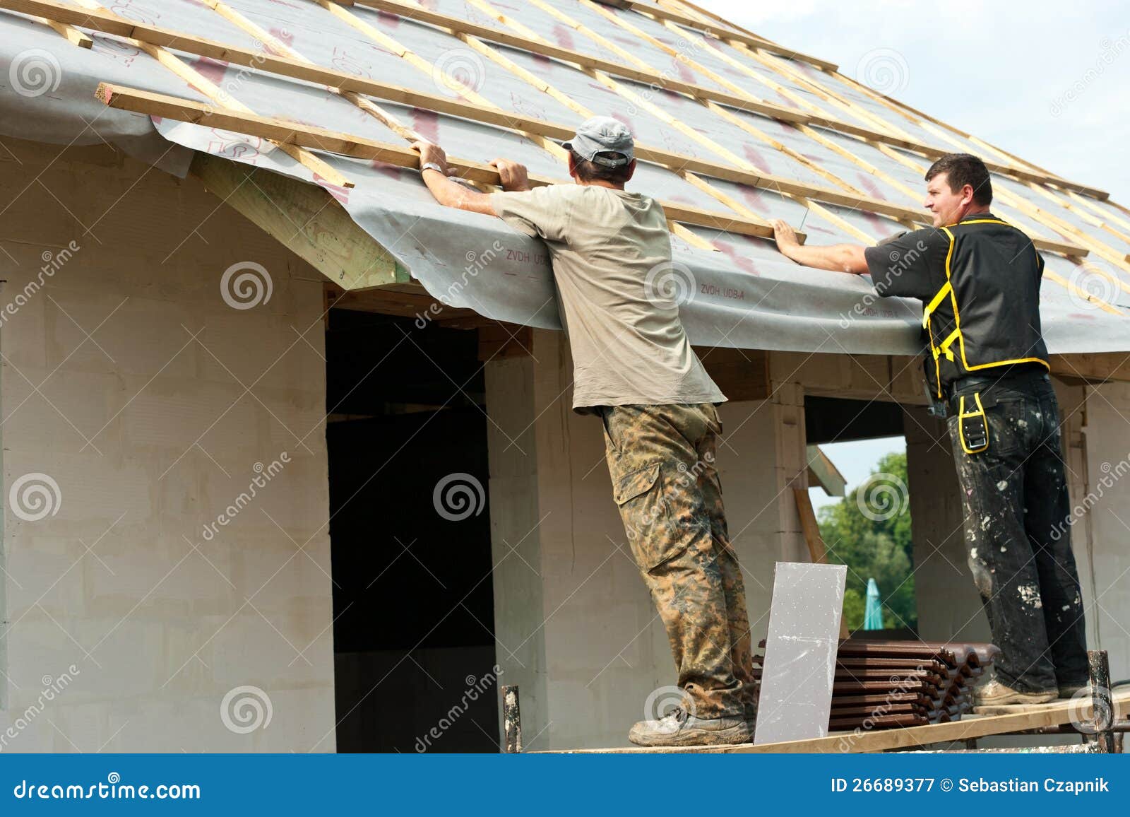 Men Putting Roof on a House Stock Image - Image of industry ...
