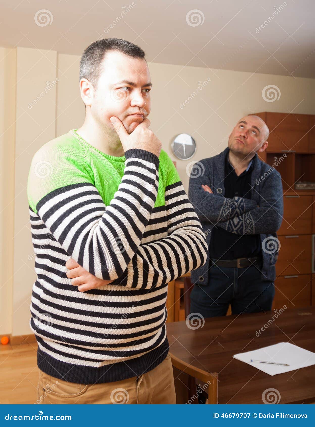 Men during quarrel at home stock image. Image of stress - 46679707