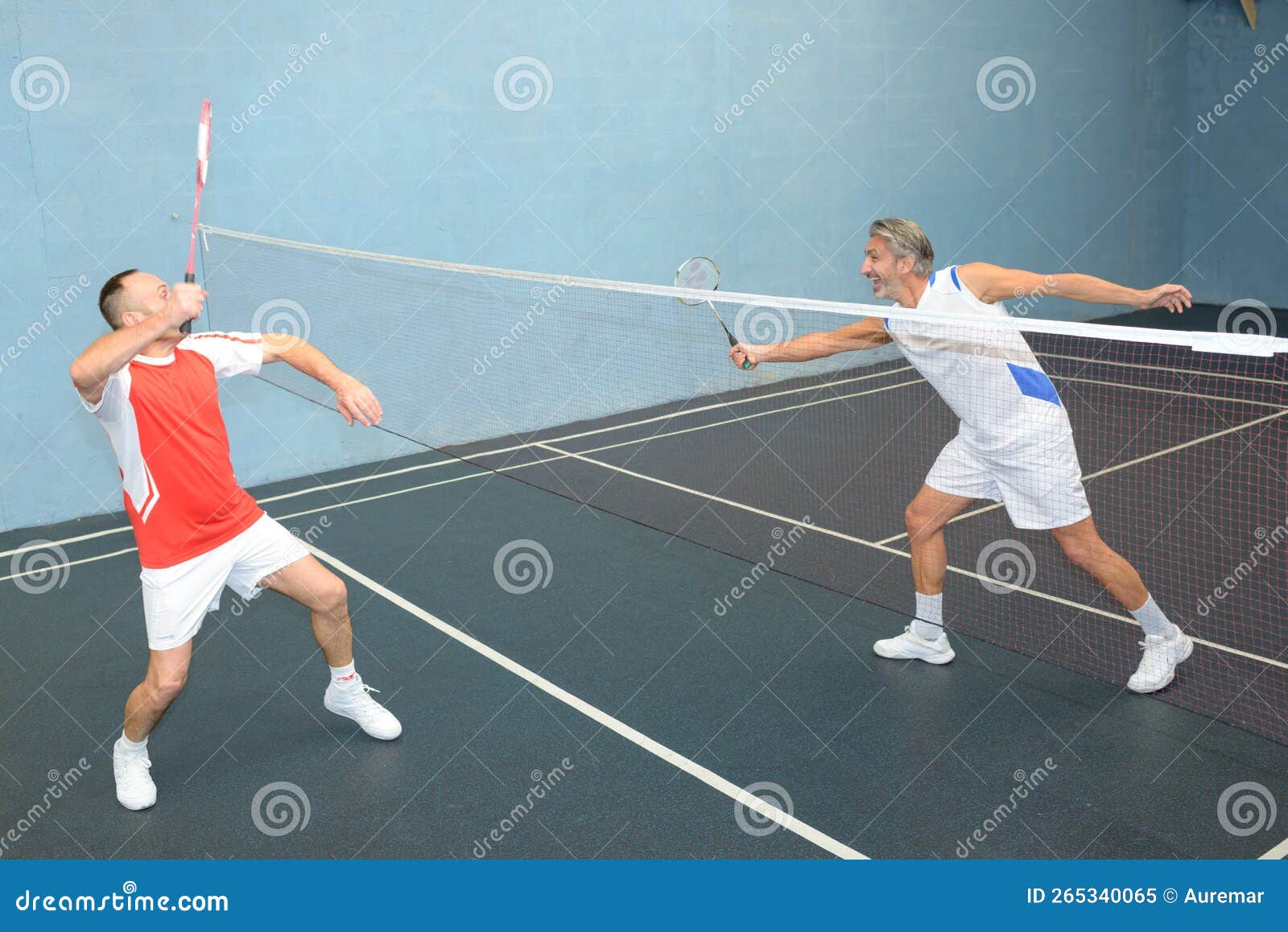 Men Reaching Out during Badminton Game Stock Image - Image of court ...