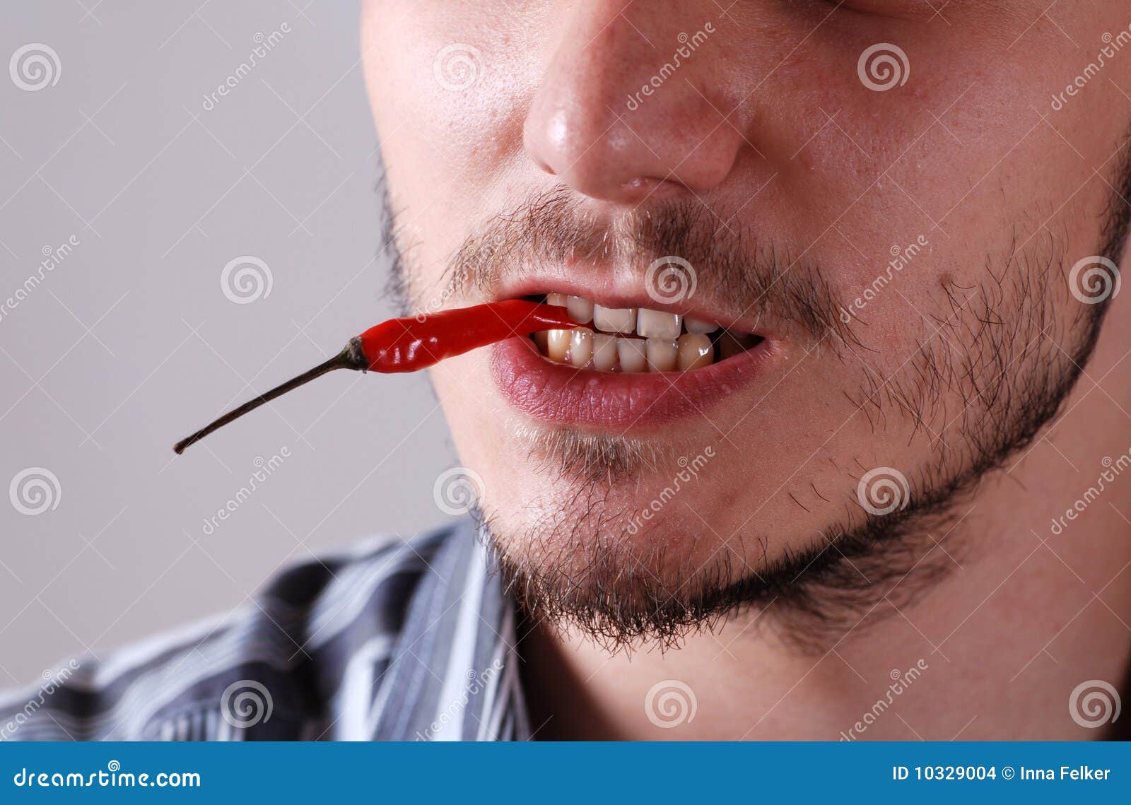Men with red chili stock photo. Image of person, lips - 10329004