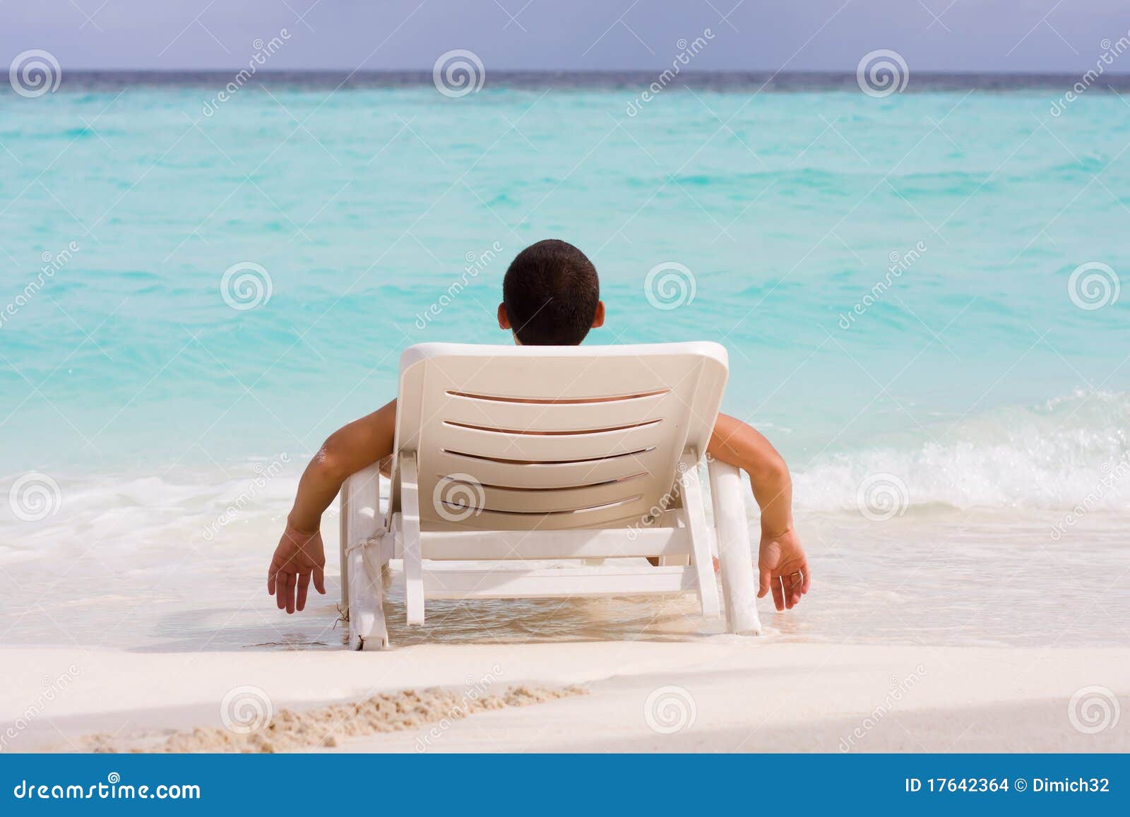 Men relaxing on abeach stock photo. Image of scene, outdoors - 17642364