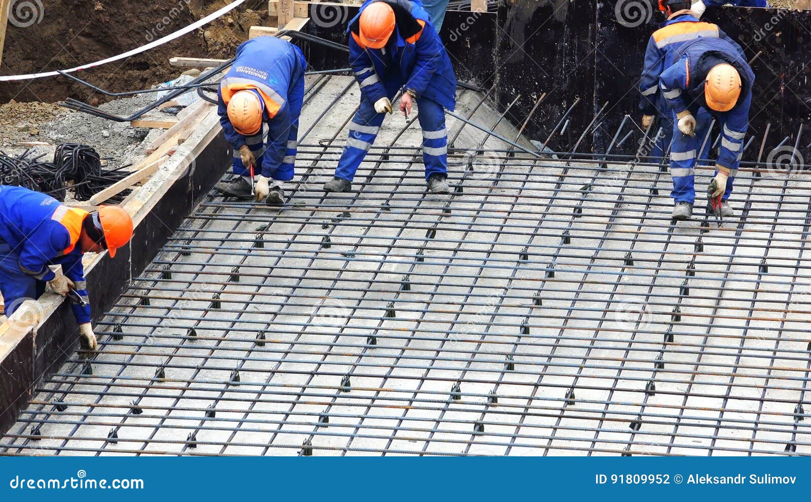 Men in a Robe Tool Knit Reinforcement for a Foundation Slab Stock ...