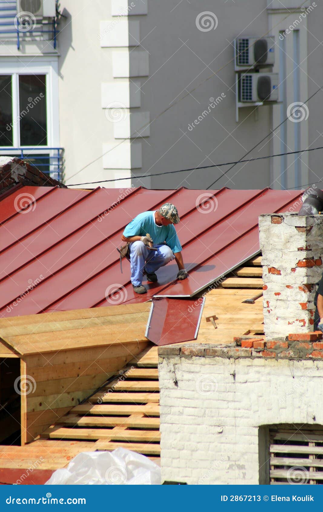 Men on roof stock image. Image of activity, renovation - 2867213