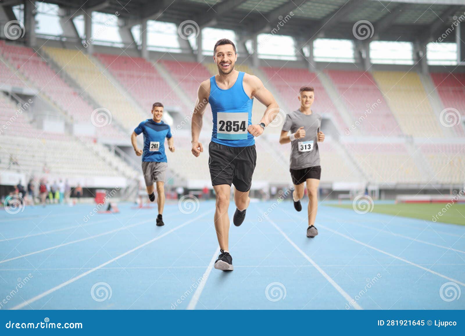Men Running a Race at a Stadium Stock Image - Image of motion, race ...