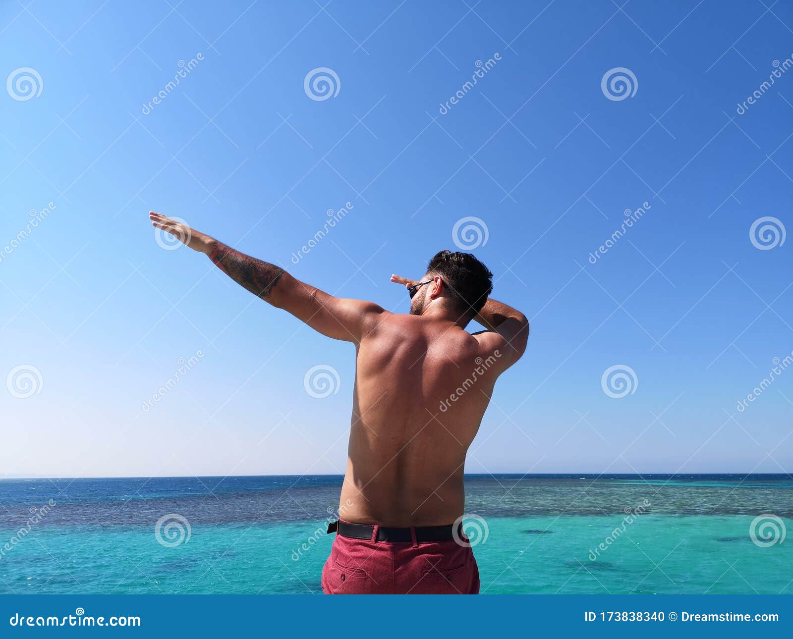 Men`s Back Against the Backdrop of a Water Plexus of the Sea, Relax and ...