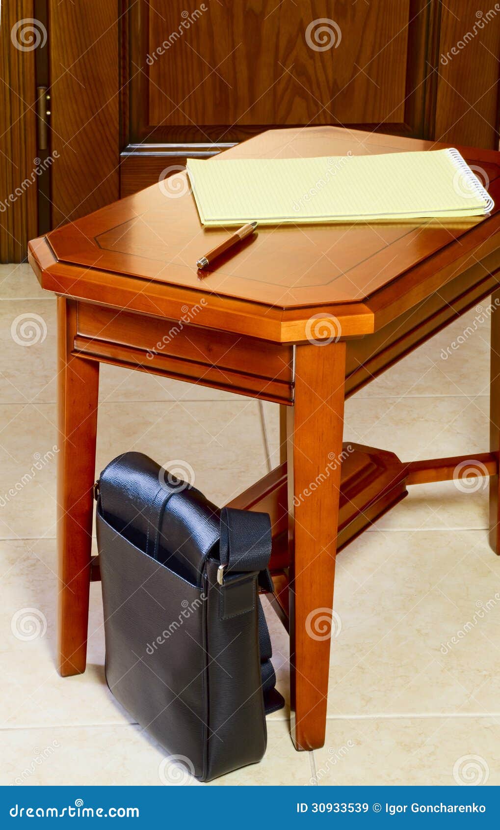 Men S Bag Next To the Coffee Table Stock Image - Image of table, casual ...