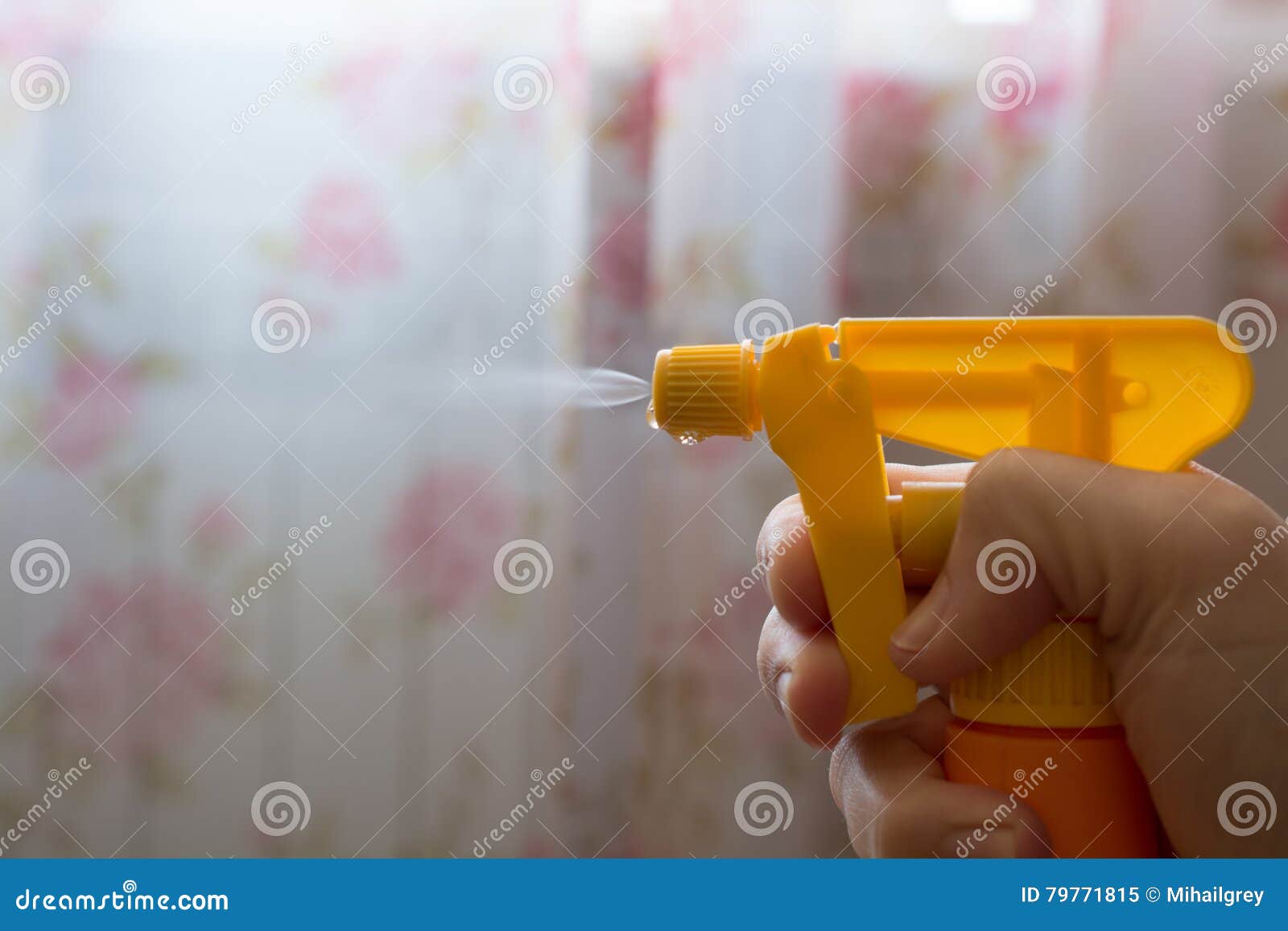 Men S Hand Holding Spray Bottle and Spraying Water. Stock Image - Image ...