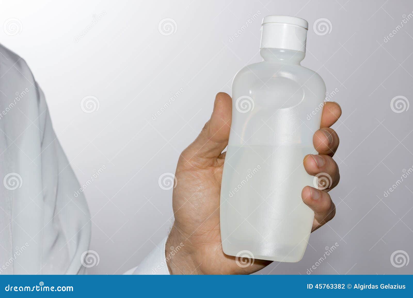 Men S Hand with a Plastic Bottle Stock Photo - Image of bright, closeup ...