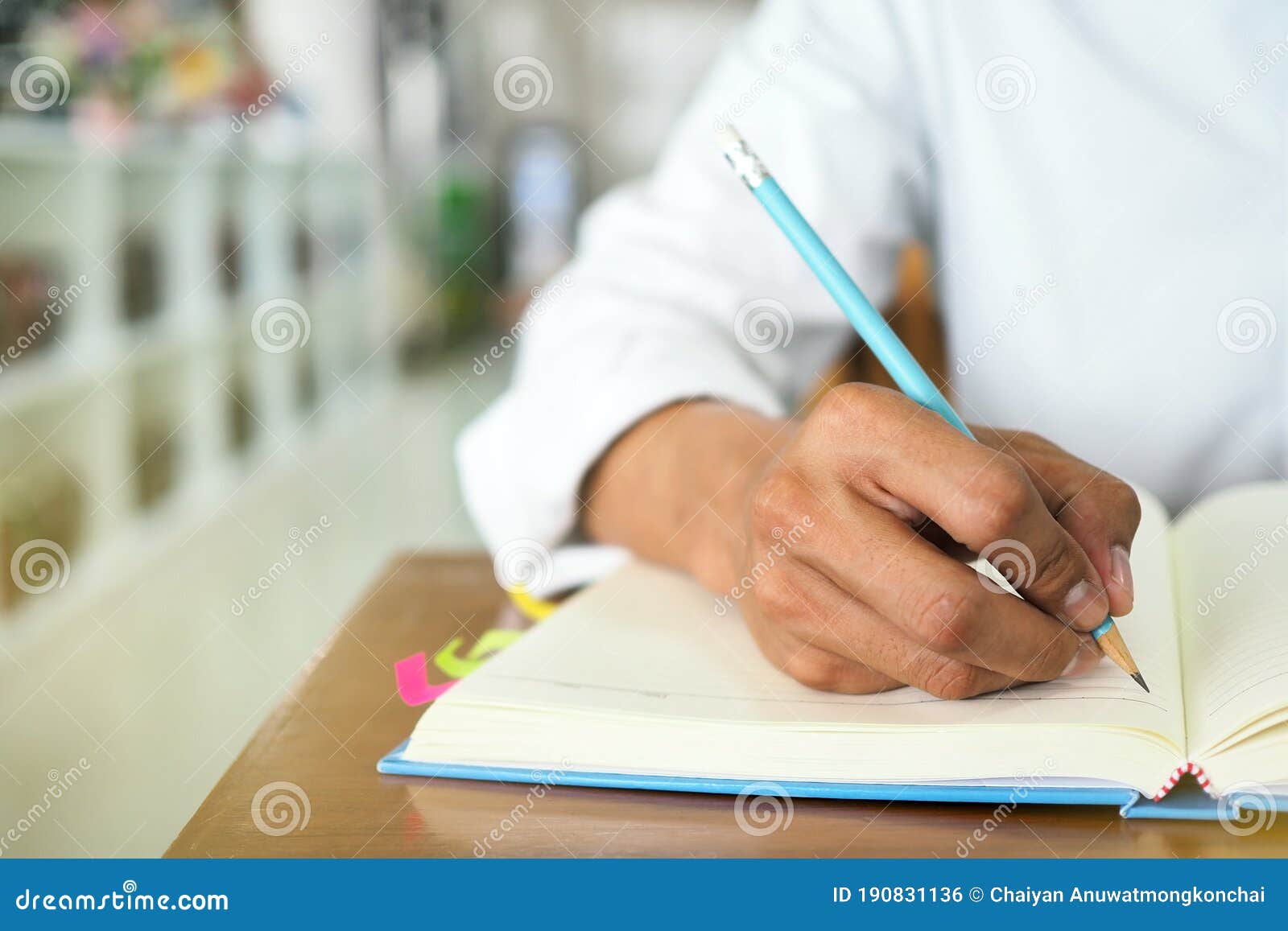 Men Hand is Writing a Book. Sit in the Library Stock Photo - Image of ...