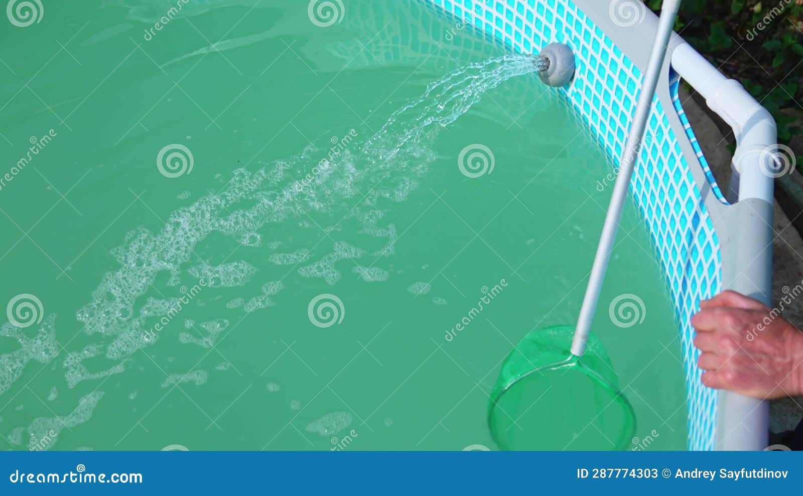 Hands Clean the Pool with Midge, and the Water in the Pool is Cleaned ...