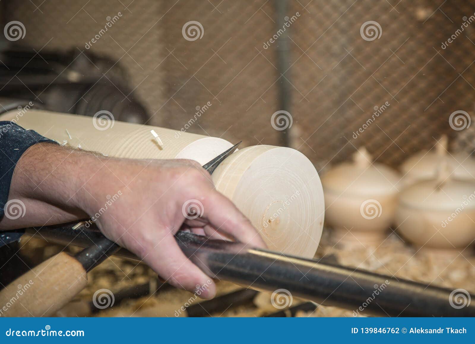 Men`s Hands Holding a Chisel Near the Lathe on Wood Stock Photo - Image ...