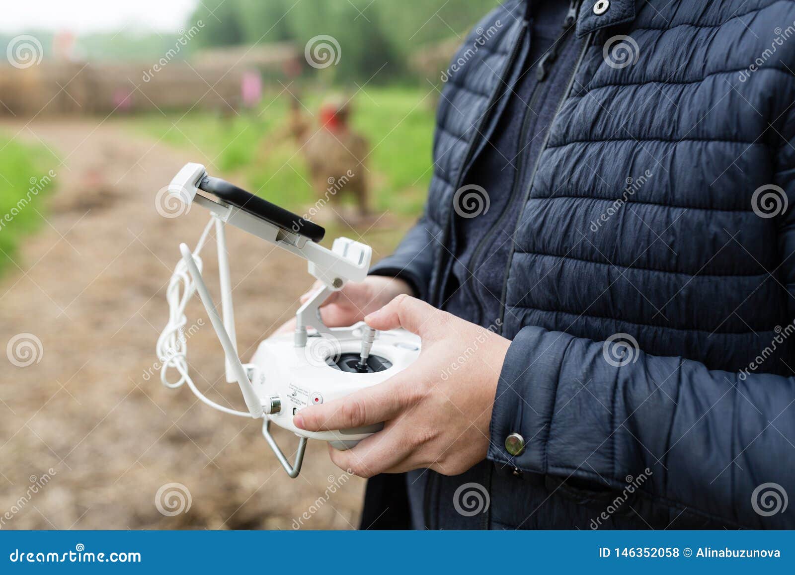Men`s Hands Holding Remote Control of Drone. Using Technology Stock ...