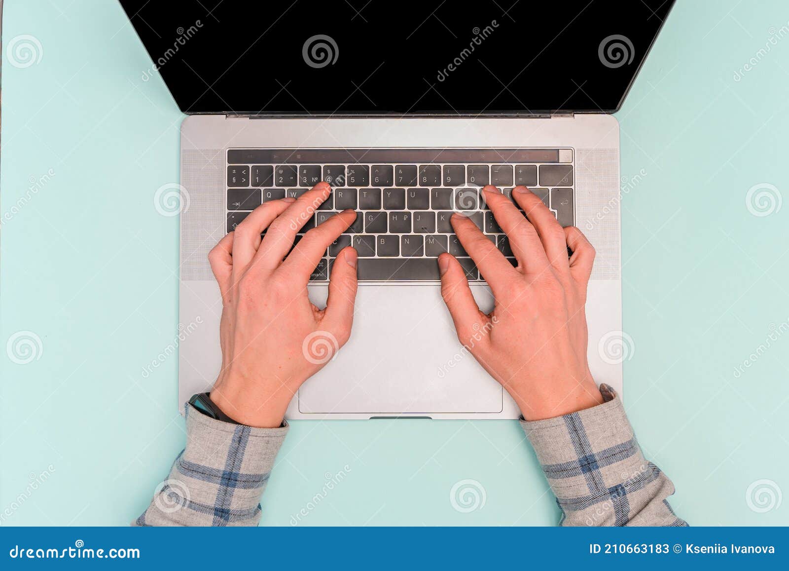 Men`s Hands Work Behind Laptops on a Blue Desk, Top View and Space for ...