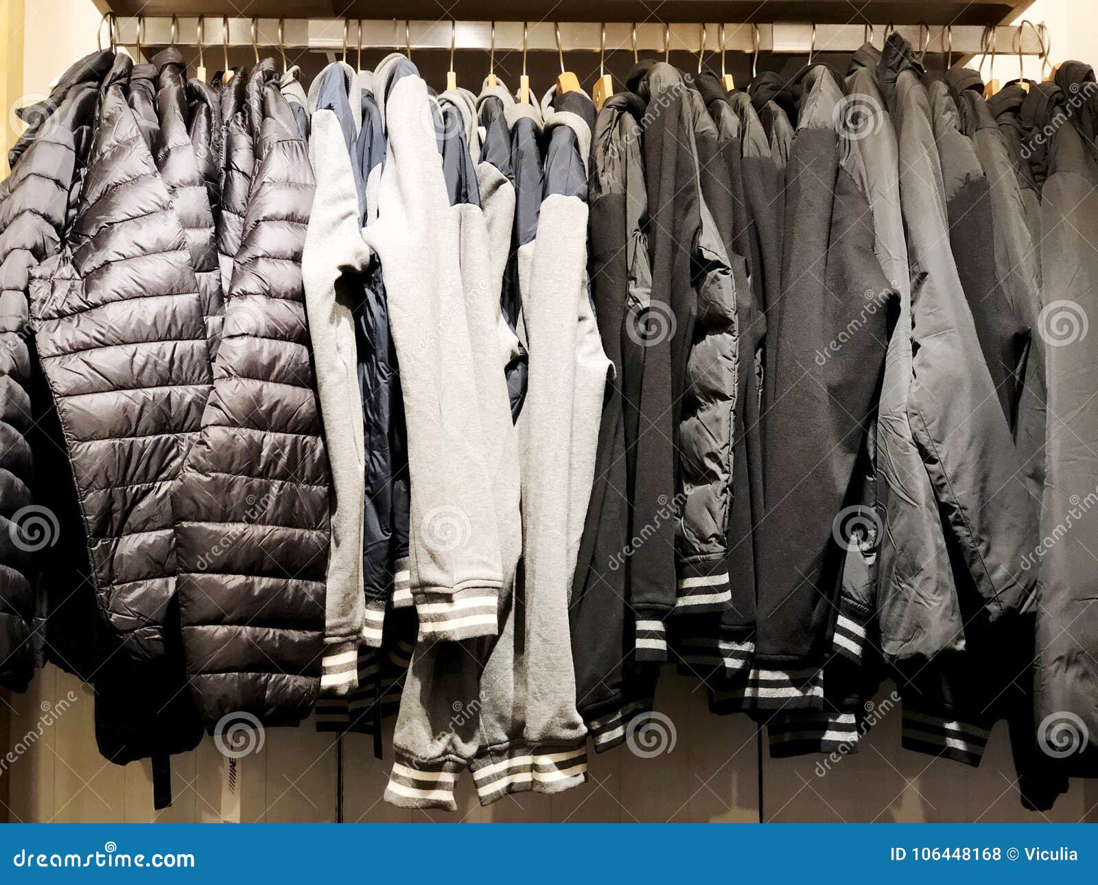 Men`s Down Jackets on the Counter in the Store Stock Photo - Image of ...