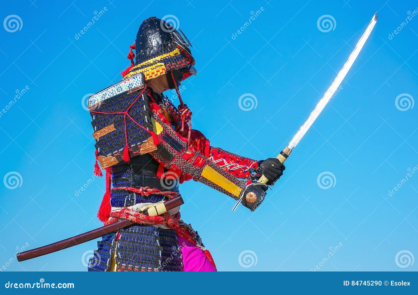 Men in Samurai Armour with Sword on Blue Sky Background. Stock Photo ...