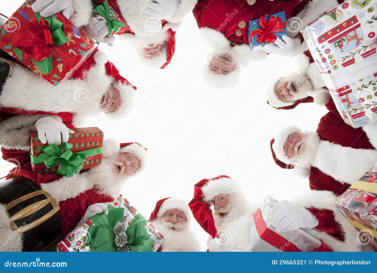 Men in Santa Claus Outfits Forming Huddle Stock Image - Image of ...