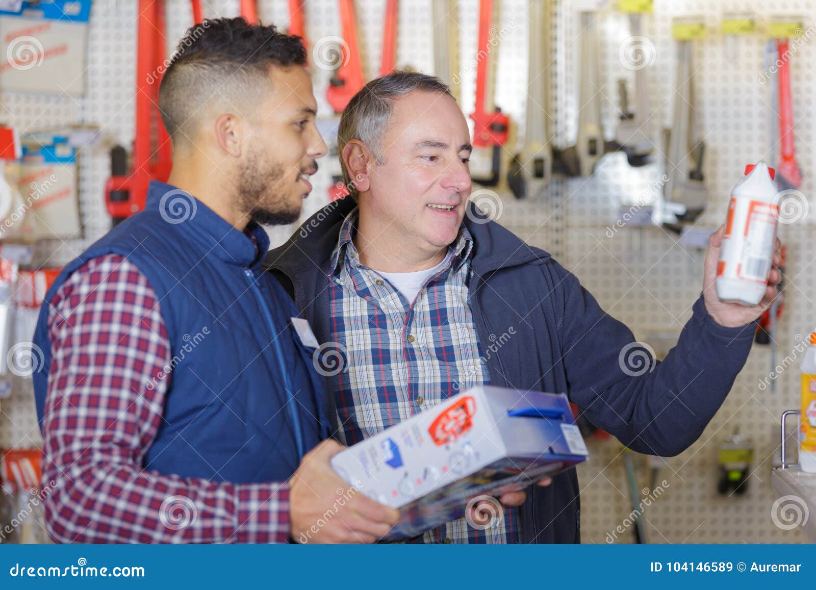 Men Selecting Product in Hardware Store Stock Image - Image of person ...