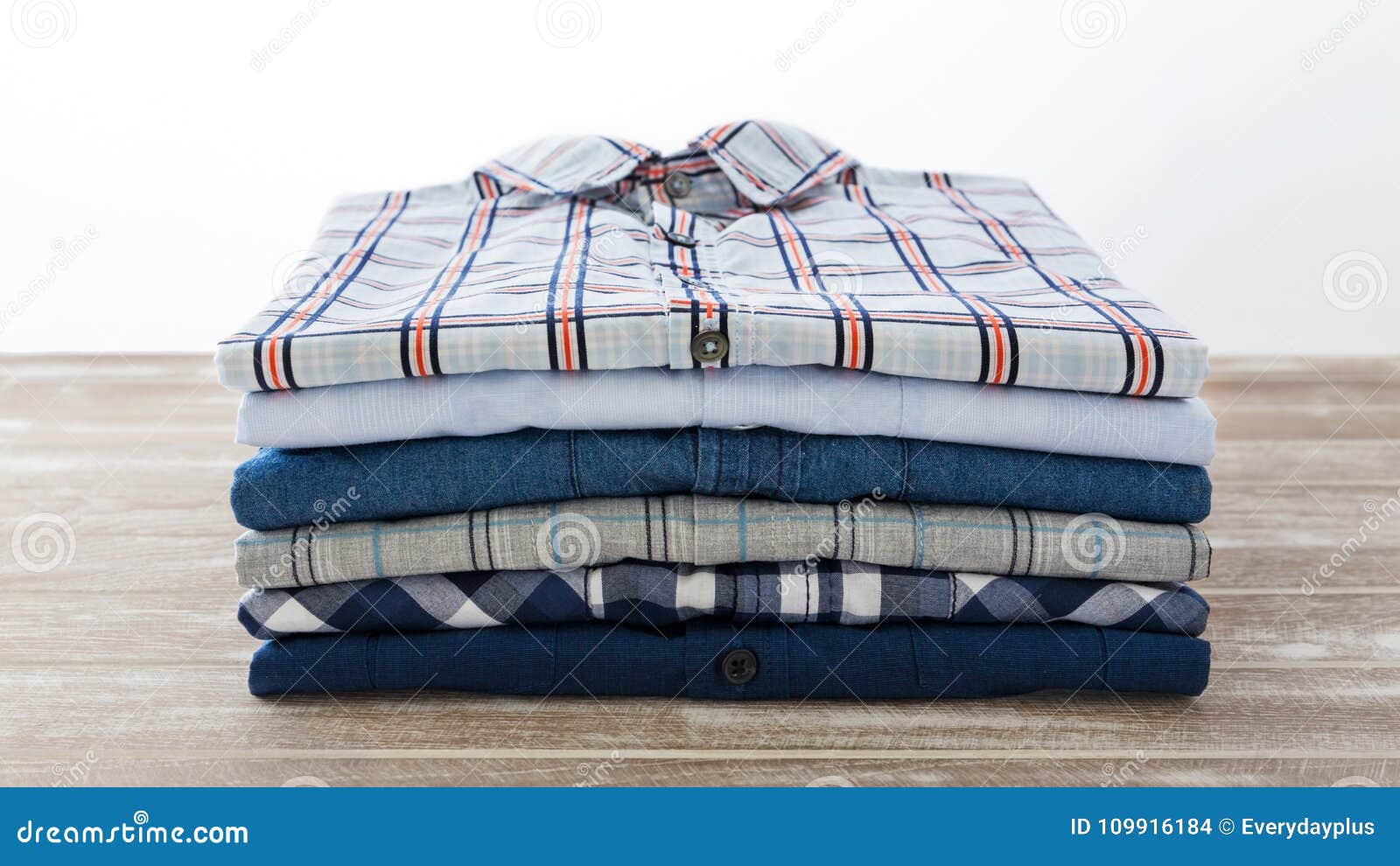 Men shirts on table stock photo. Image of cloth, formal - 109916184