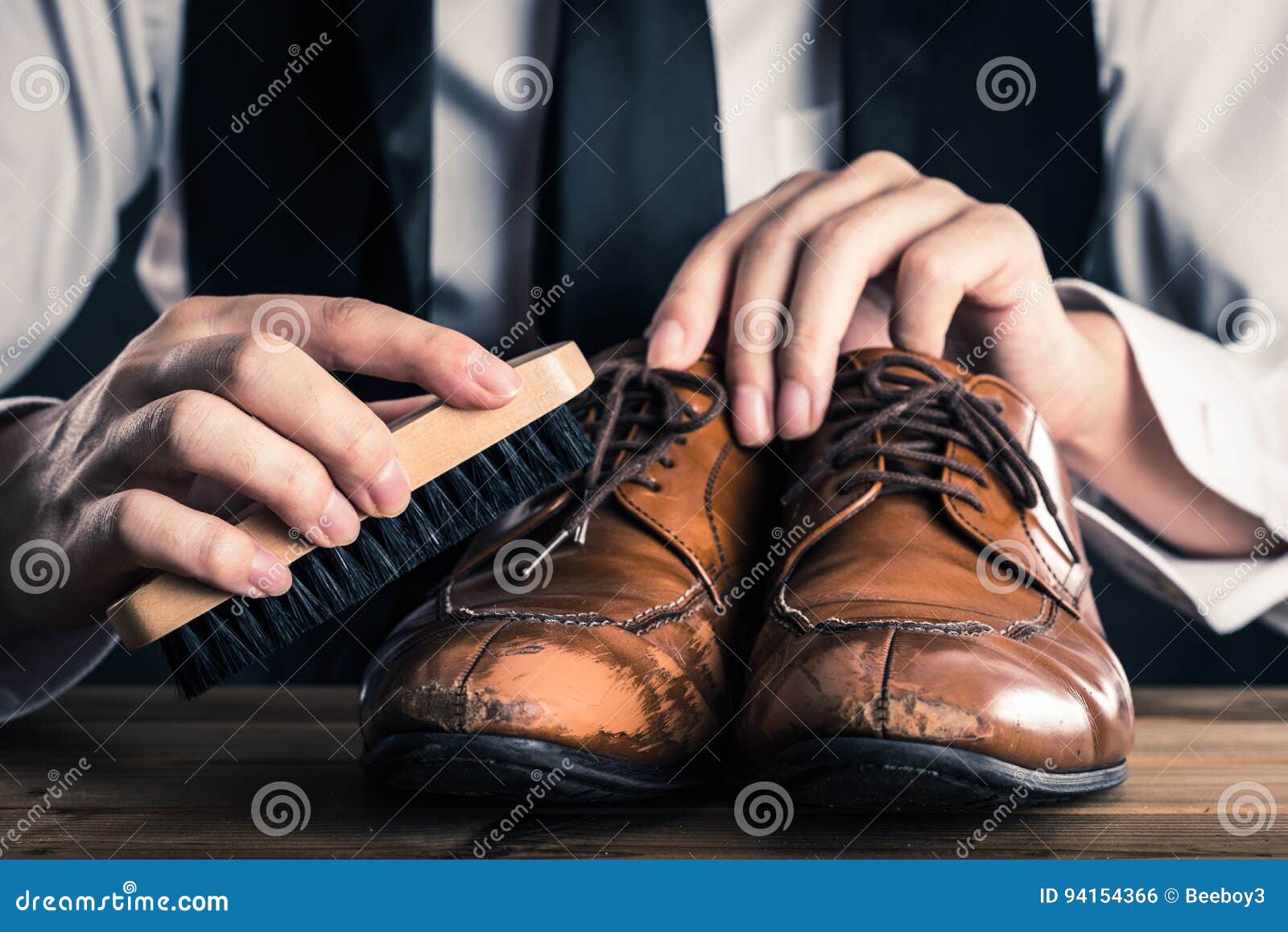 Men Shoe-polishing on a Wooden Table Stock Photo - Image of business ...
