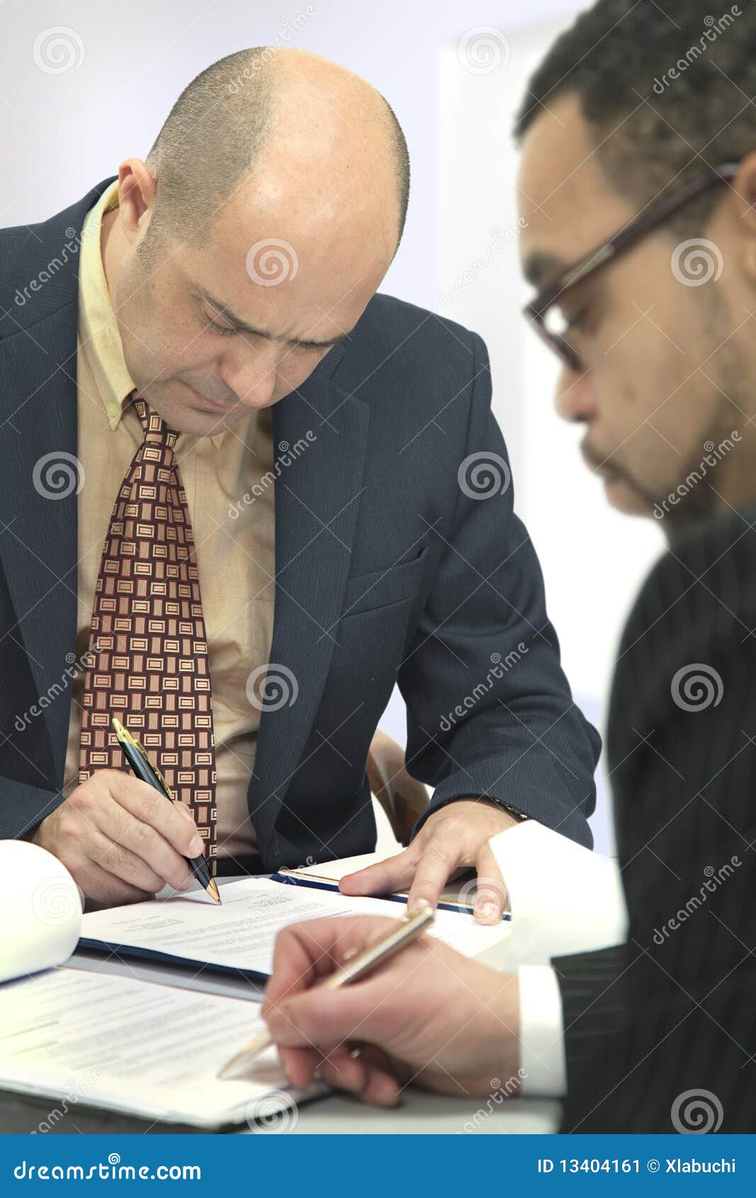Men sign the contract stock image. Image of contract - 13404161