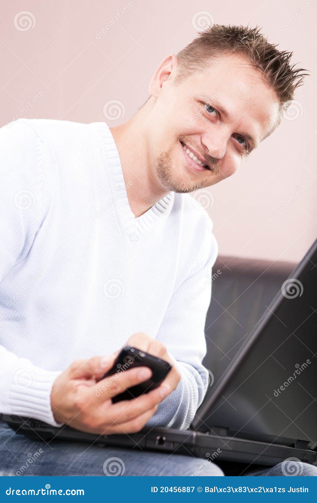 Men Sofa with Phone and Computer Use. Stock Image - Image of face ...