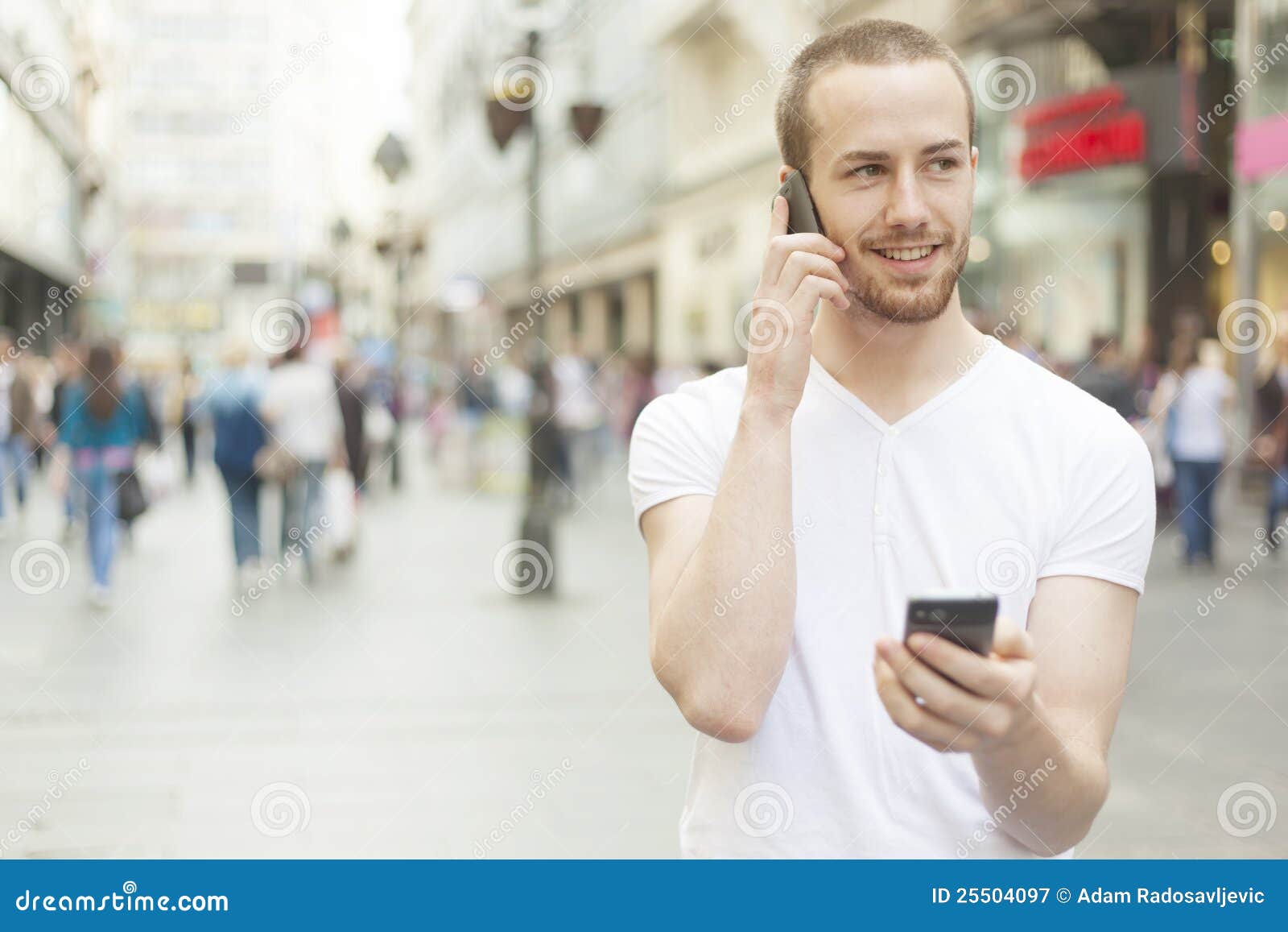 Men Speaking on Mobile Phone and Holding Secund Stock Image - Image of ...
