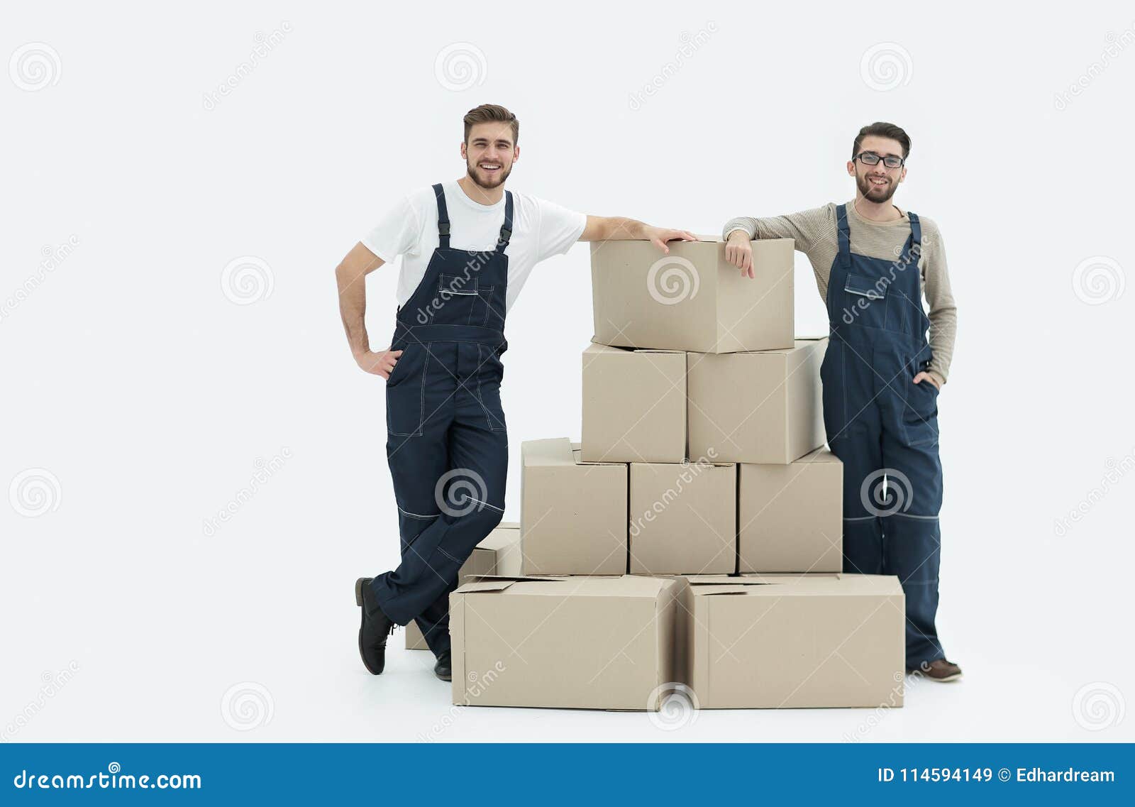 Young Men Carrying a Box To the Pile of Boxes. Stock Image - Image of ...