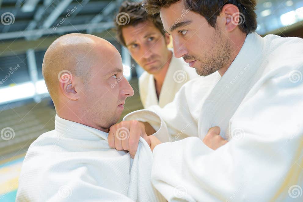 Men staring at each other stock image. Image of entertainment - 288845471