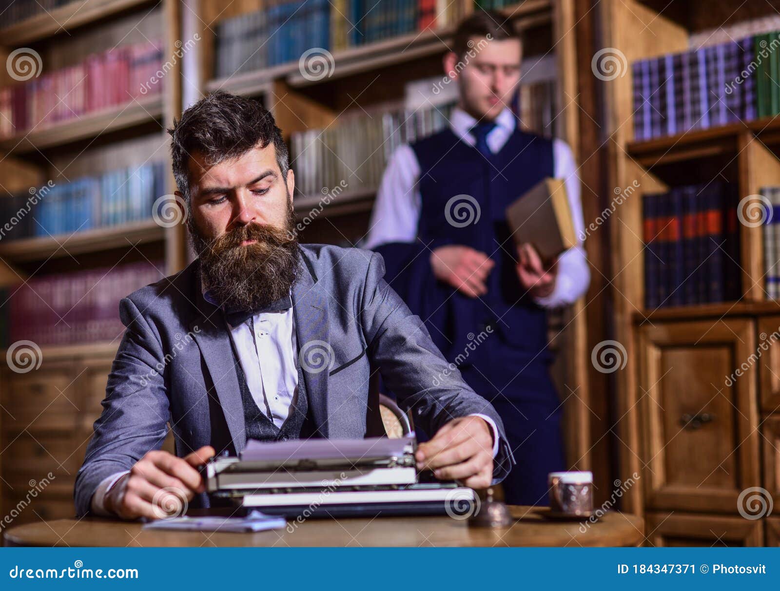 Men In Suits In Library With Antique Books On Background. Stock Image ...
